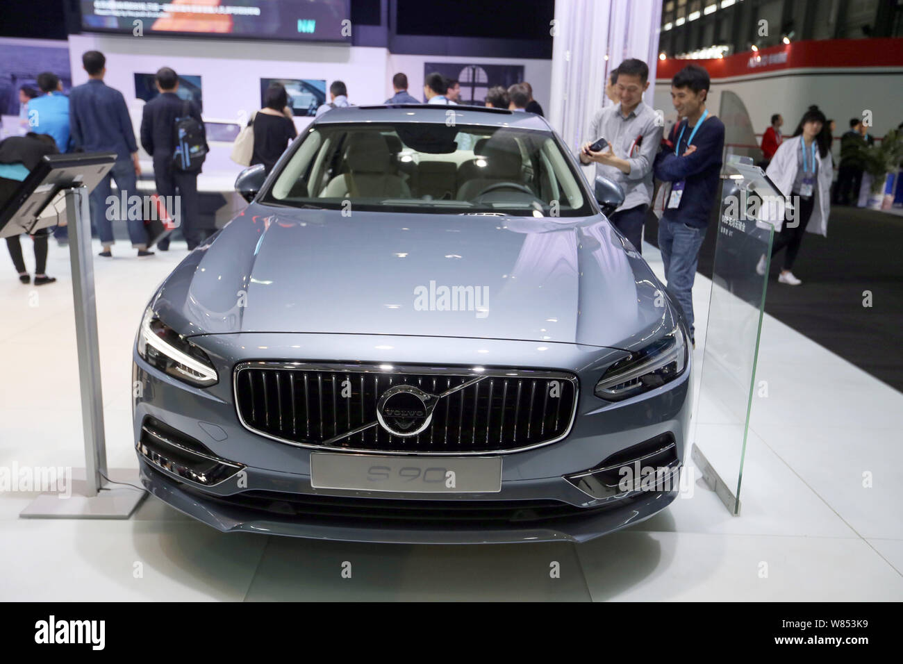 --FILE--Visitors look at a Volvo S 90 during the International CEE Asia ...