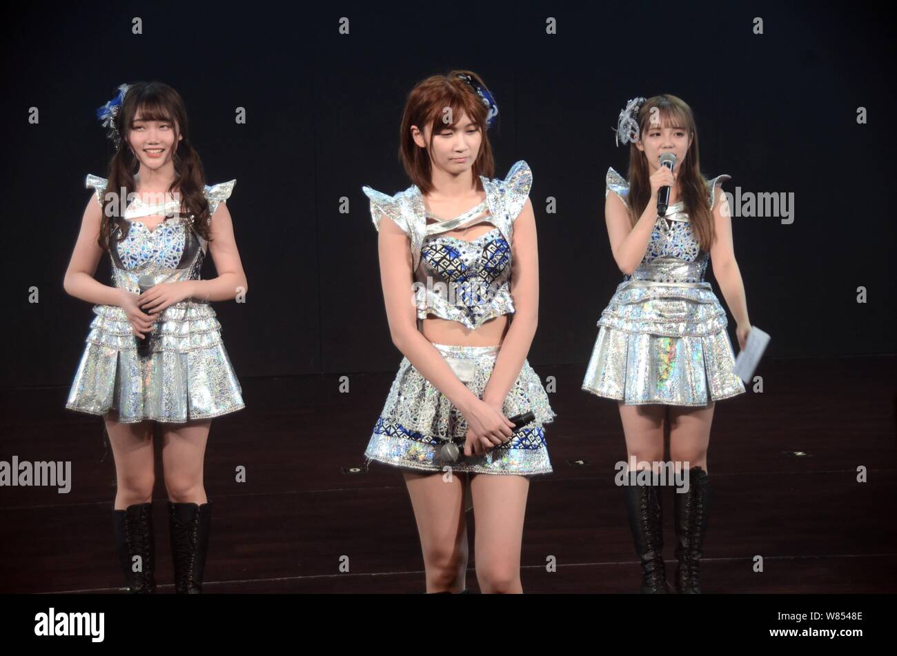 Members of Chinese girl group SNH48 perform at their concert in ...