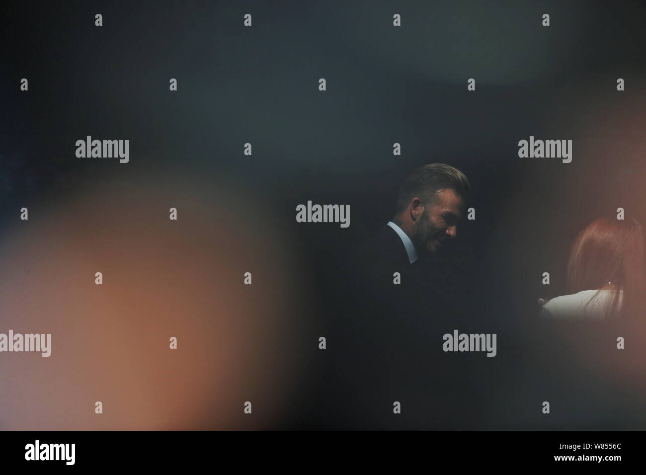 English soccer star David Beckham attends a press conference for Luneng ...