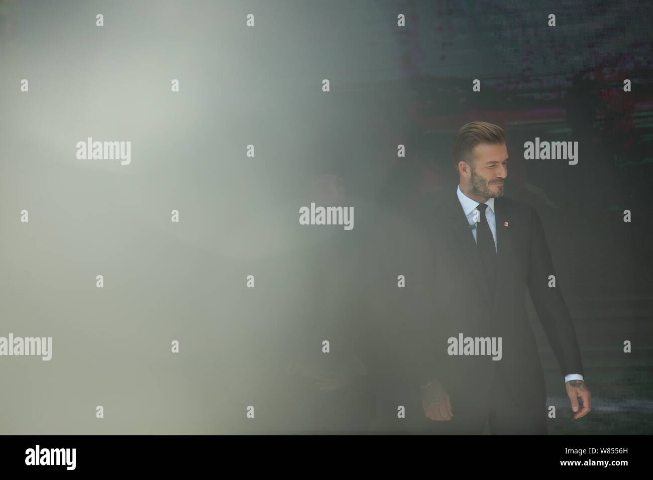 English soccer star David Beckham attends a press conference for Luneng ...