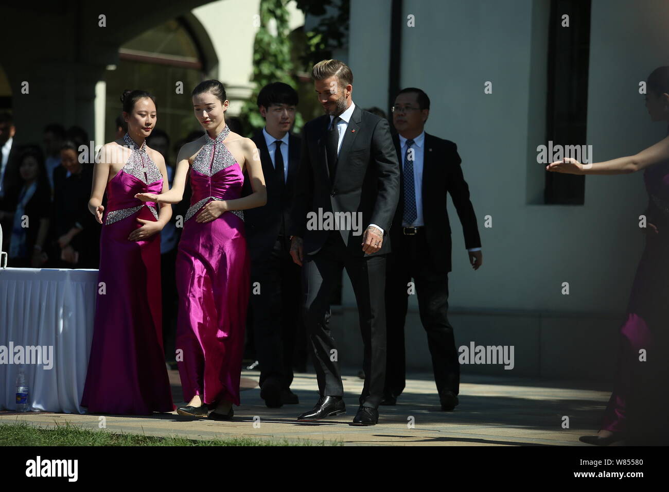 English soccer star David Beckham, center, attends a press conference ...