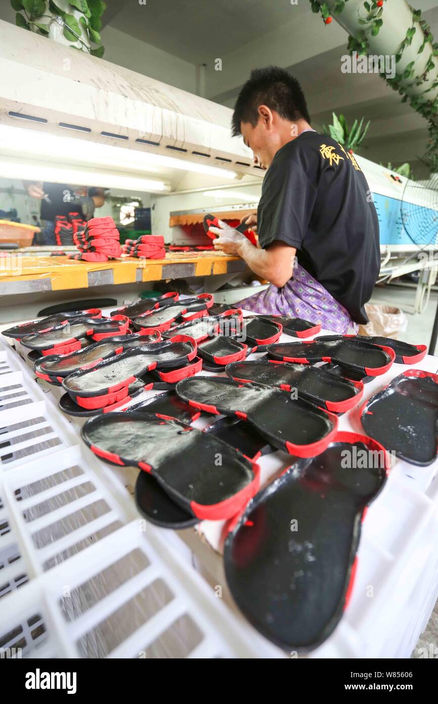 Chinese slippers hi-res stock photography and images - Alamy