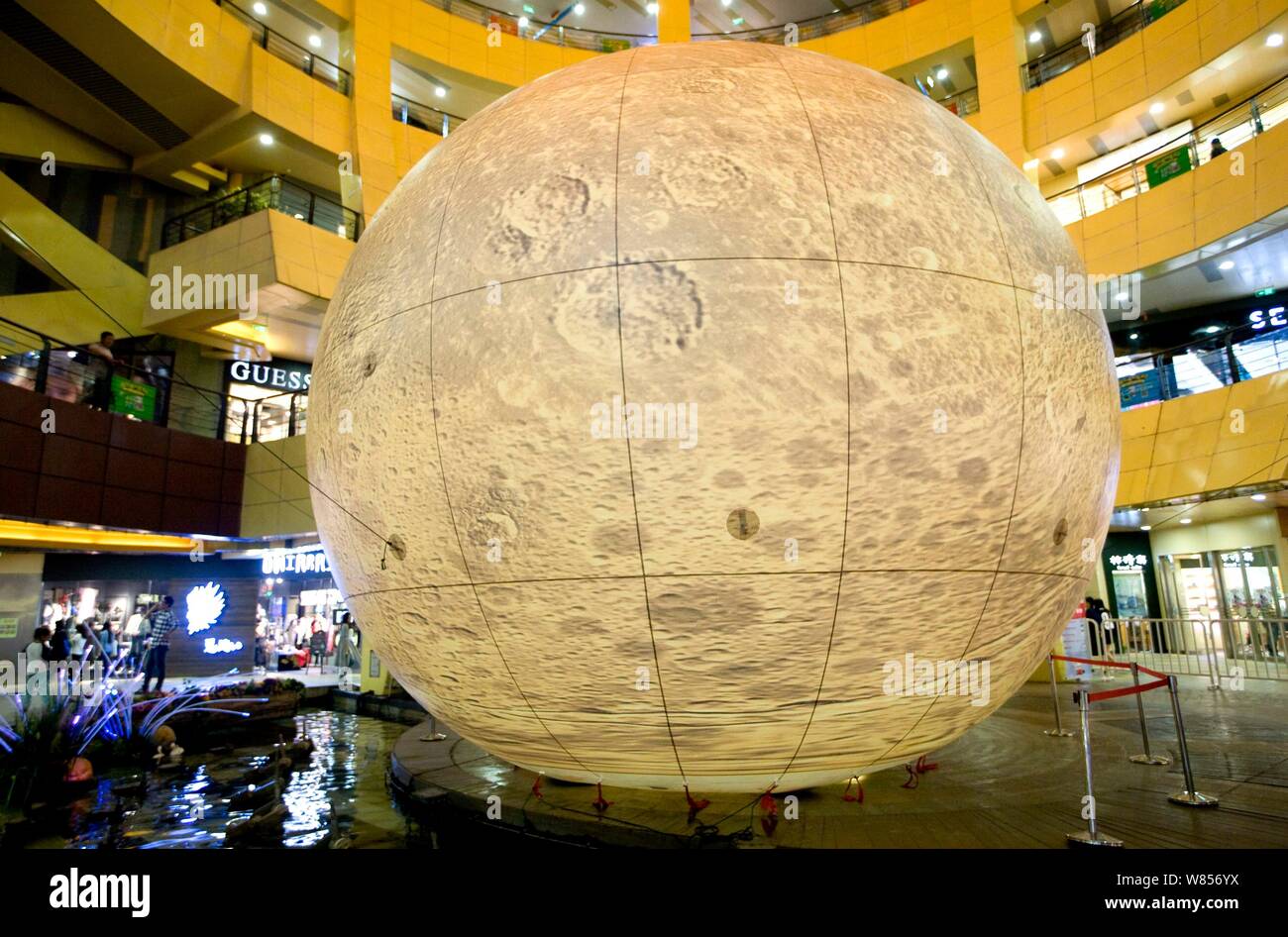 --FILE--A giant balloon which looks like the moon is on display to ...