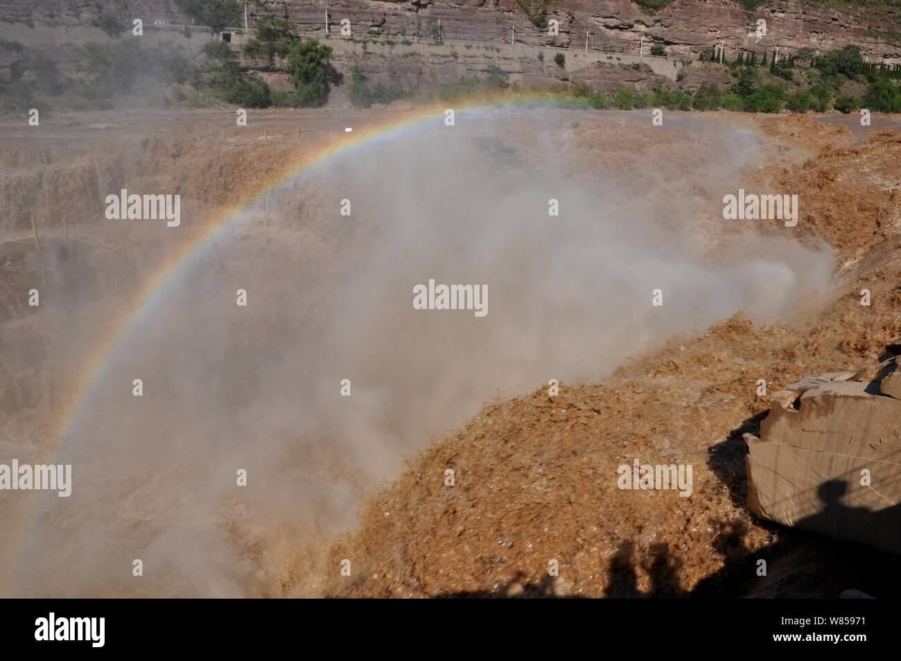 View of the Hukou Waterfall on the Yellow River with glorious rainbow ...