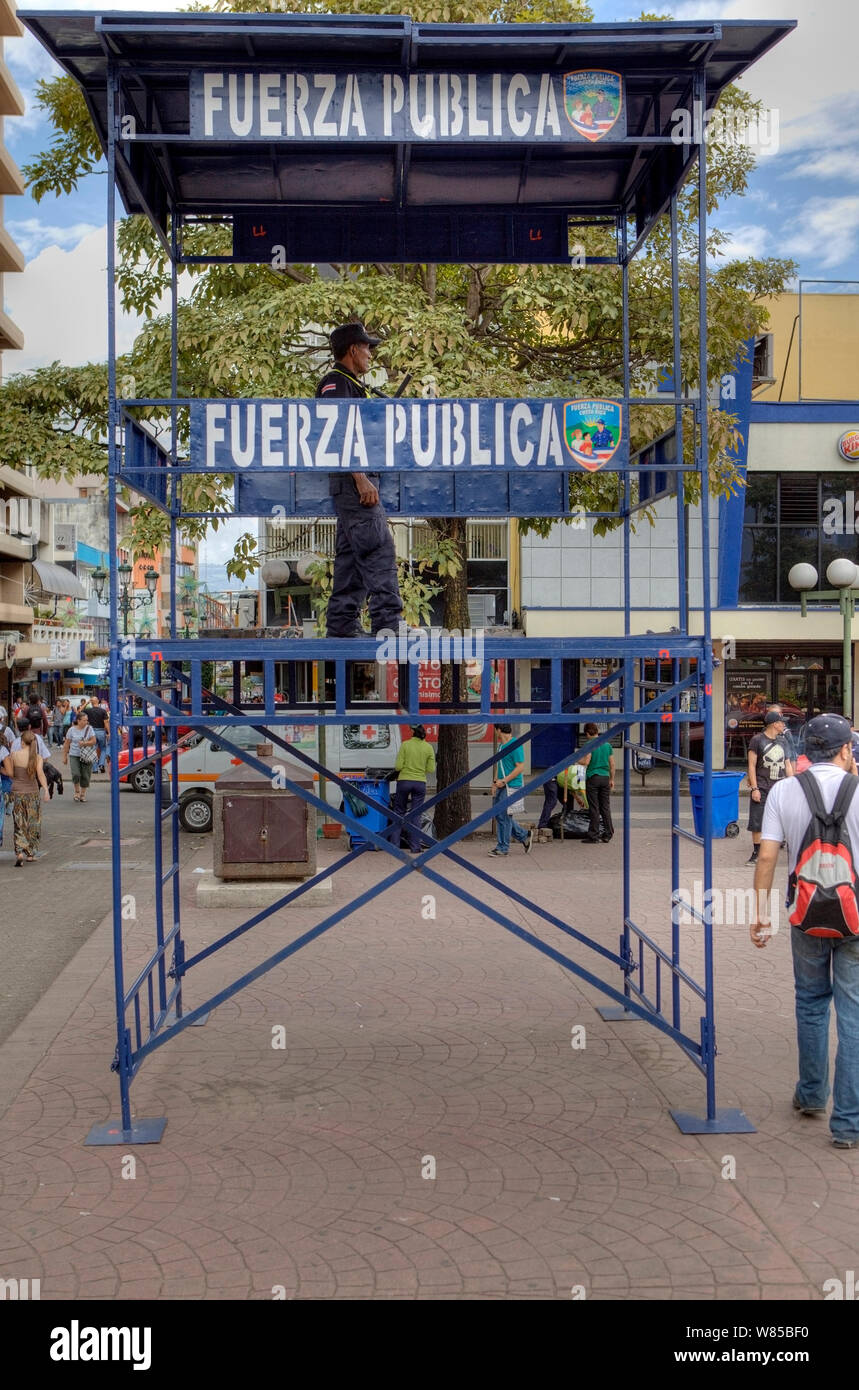Guard from Fuerza Publica / Public force standing on platform, San Jose ...