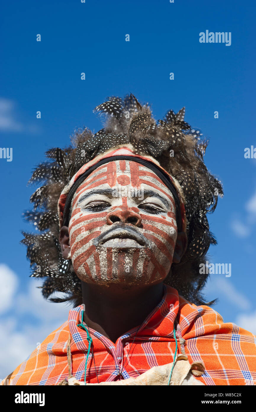 Kikuyu warrior wearing headress made of Helmeted Guineafowl (Numida ...