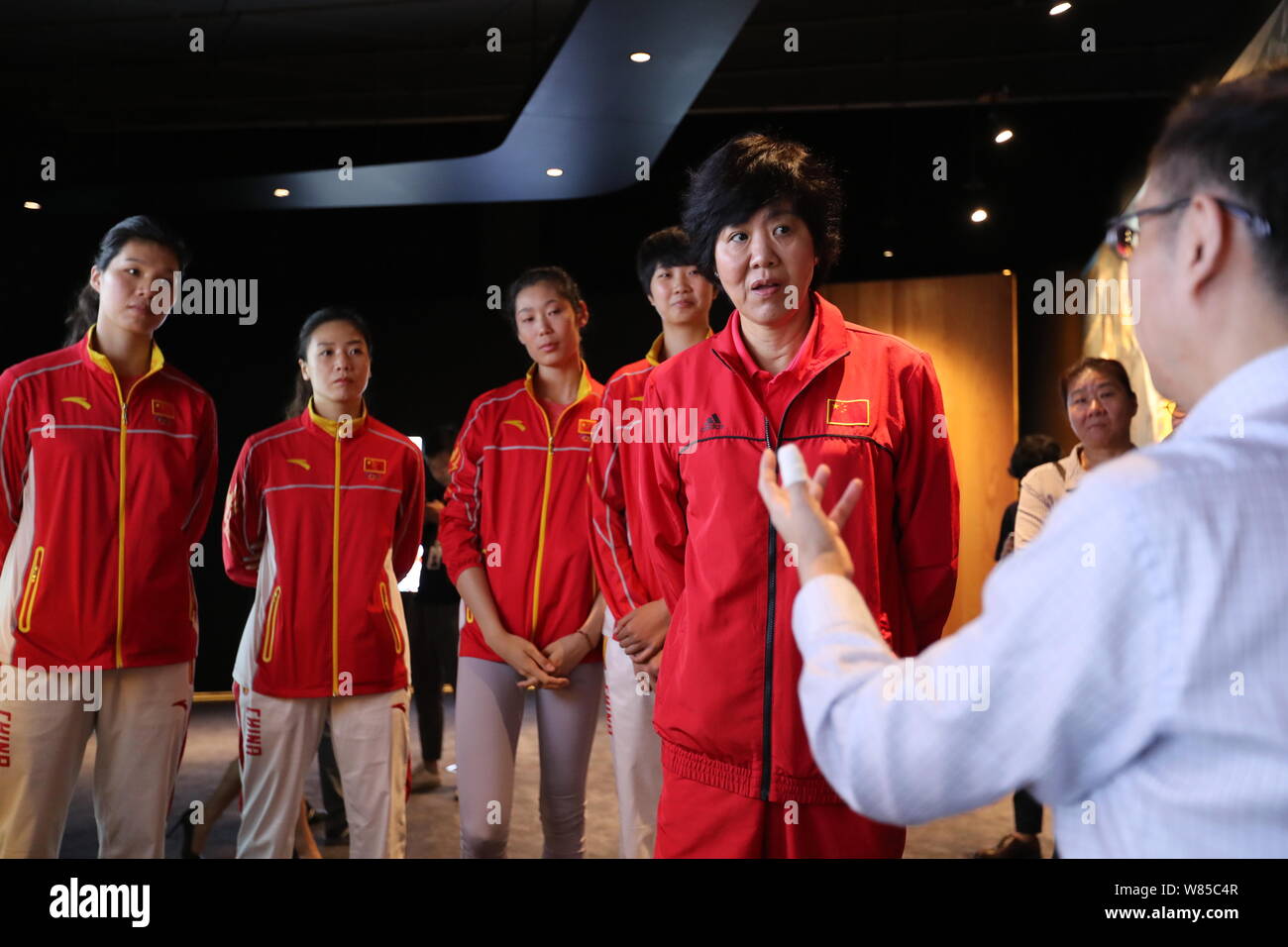 Chinese women volleyball head coach Lang Ping or Jenny Lang, right ...