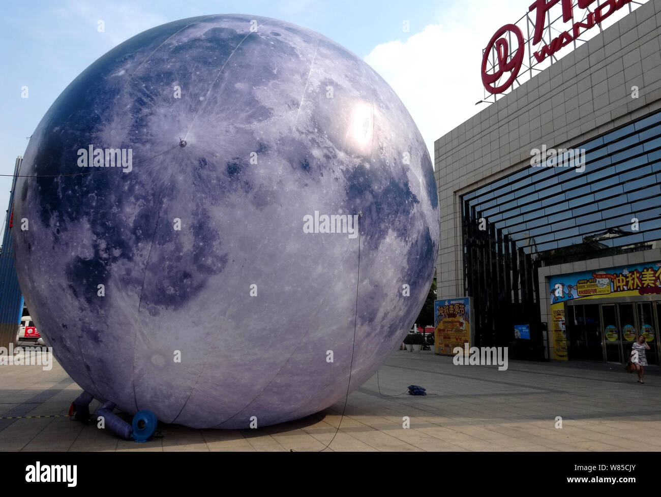 A giant sphere simulating the moon is on display to celebrate the ...