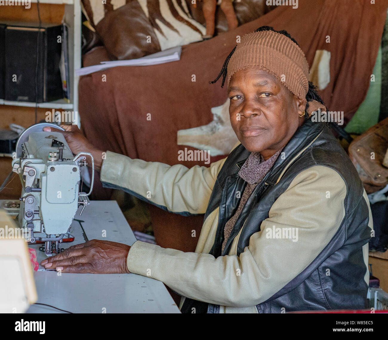 Windhoek, South Africa - July 6, 2018: a tailor sews clothes for sale ...