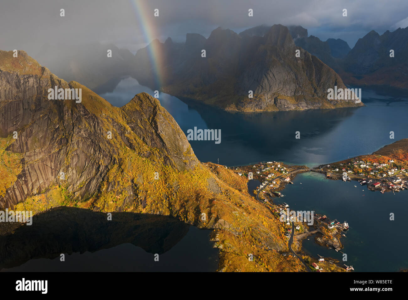 Kirkefjorden and village of Reine, viewed from Reinebringen, with rain ...