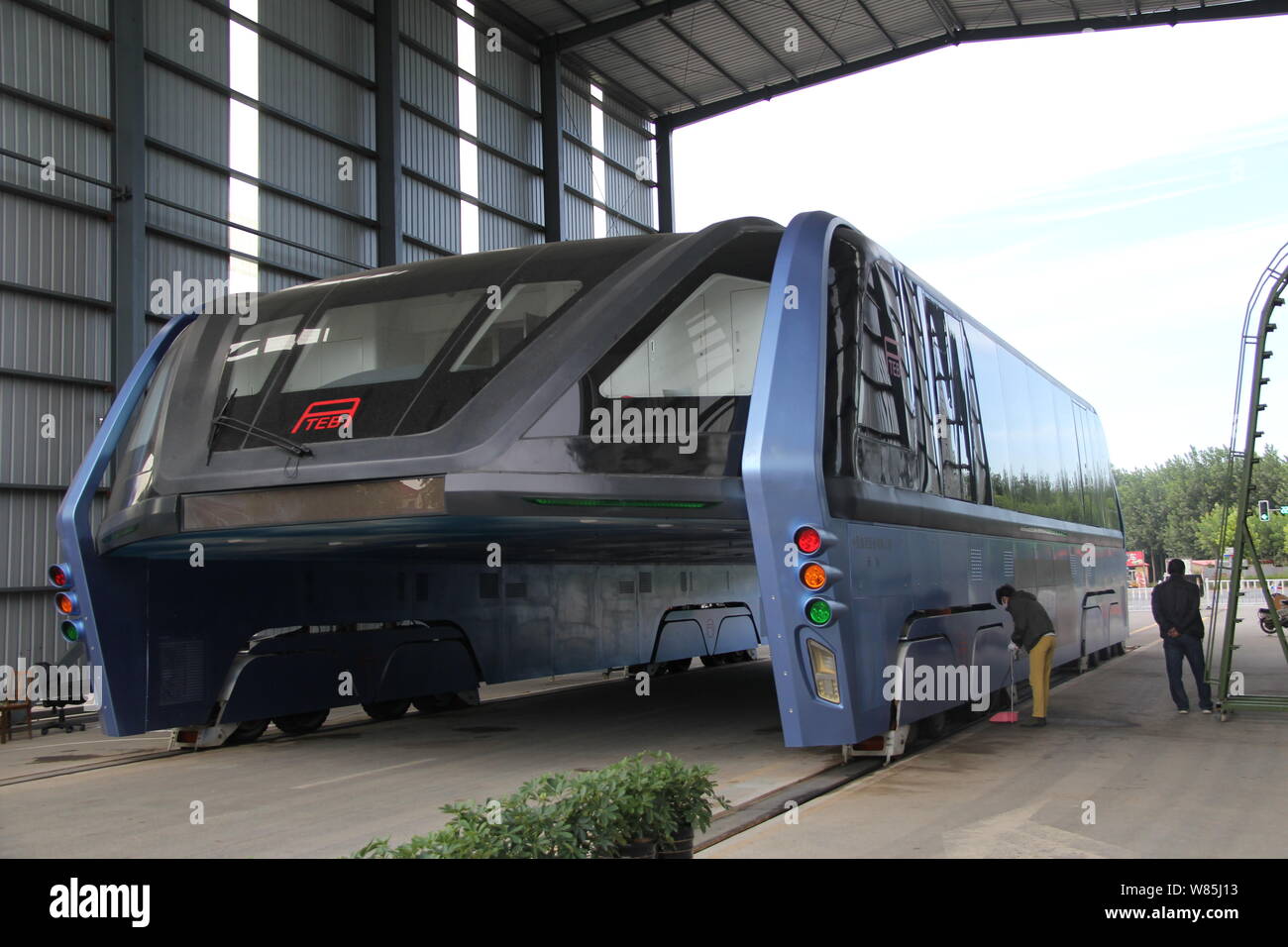 The Transit Elevated Bus (TEB) is parked in its garage on Fumin road in Qinhuangdao city, north ...