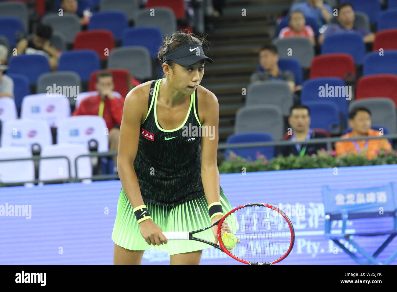 Zhang Shuai of China serves against Johanna Konta of United Kingdom in ...