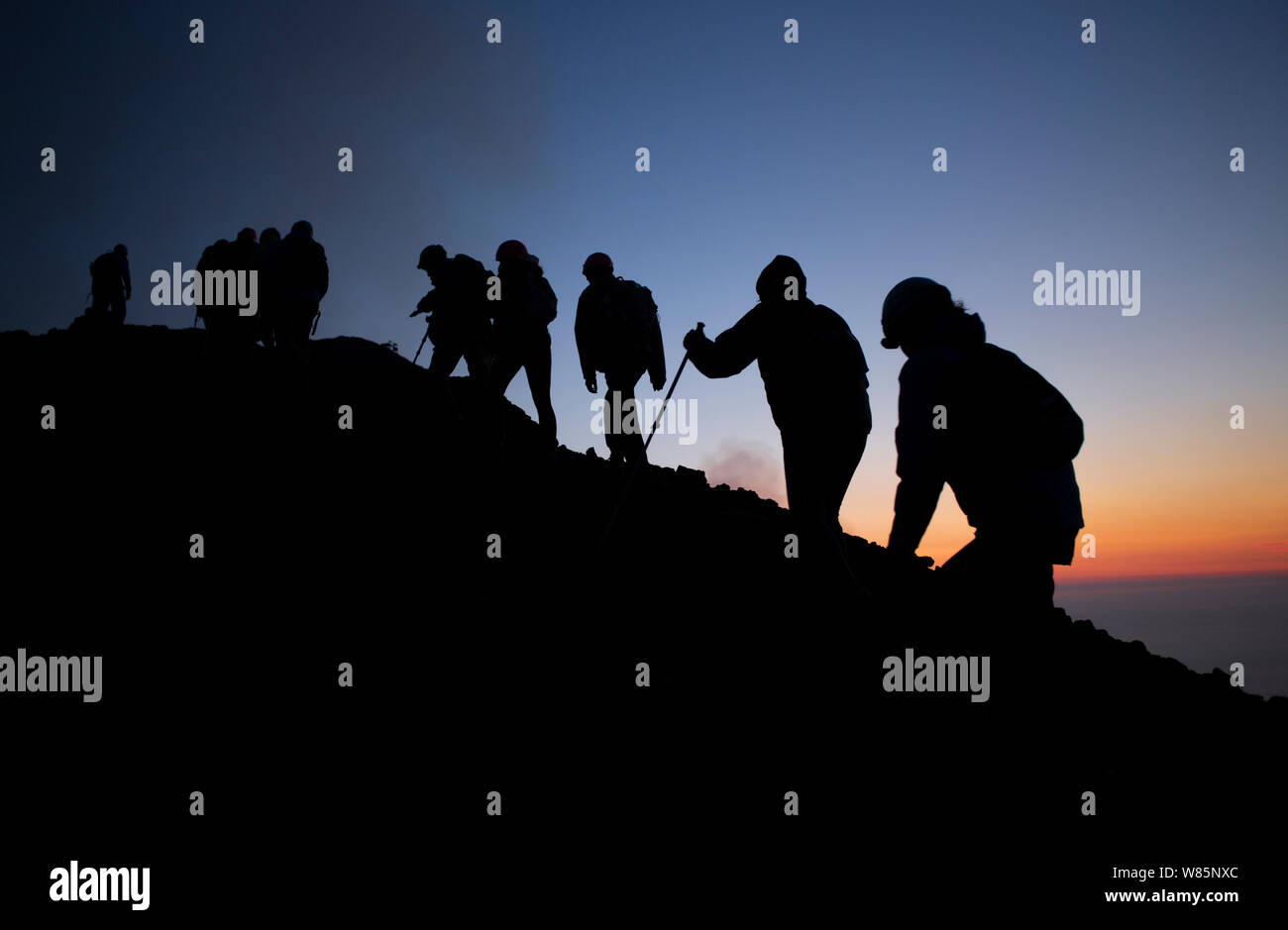 Hikers nearing the summit of active volcano Stromboli Italy Stock Photo ...