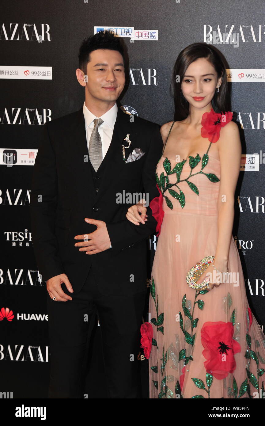 Hong Kong model and actress Angelababy, right, and her Chinese actor husband Huang Xiaoming ...