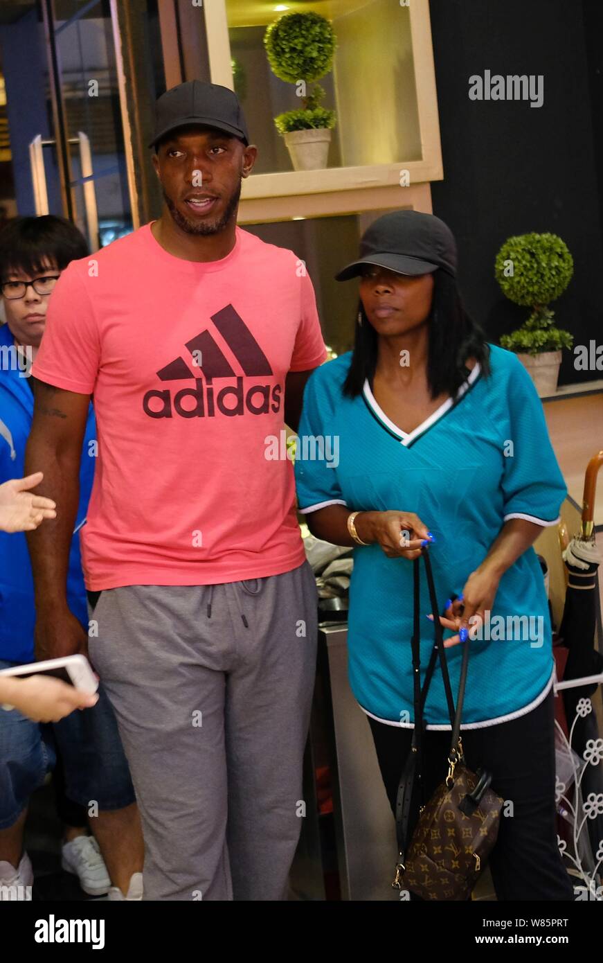 Retired NBA star Chauncey Billups, left, and his wife are pictured at a ...