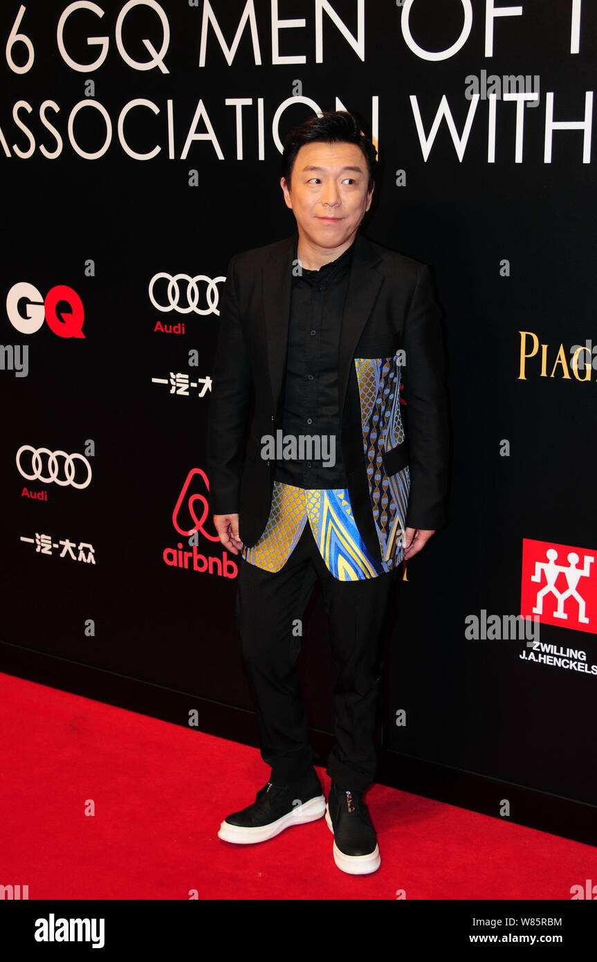 Chinese actor Huang Bo arrives on the red carpet for the award ceremony ...