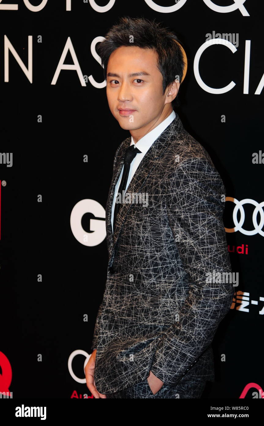 Chinese actor Deng Chao arrives on the red carpet for the award ...