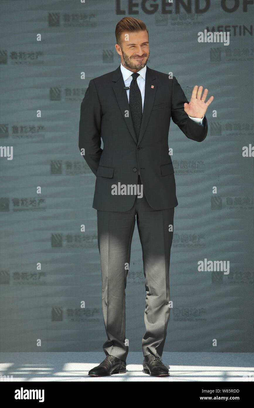 English soccer star David Beckham attends a press conference for Luneng ...