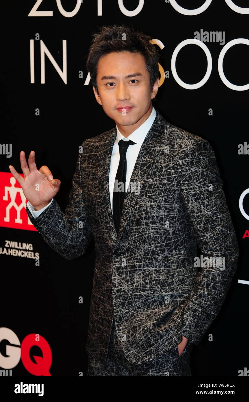 Chinese actor Deng Chao arrives on the red carpet for the award ...