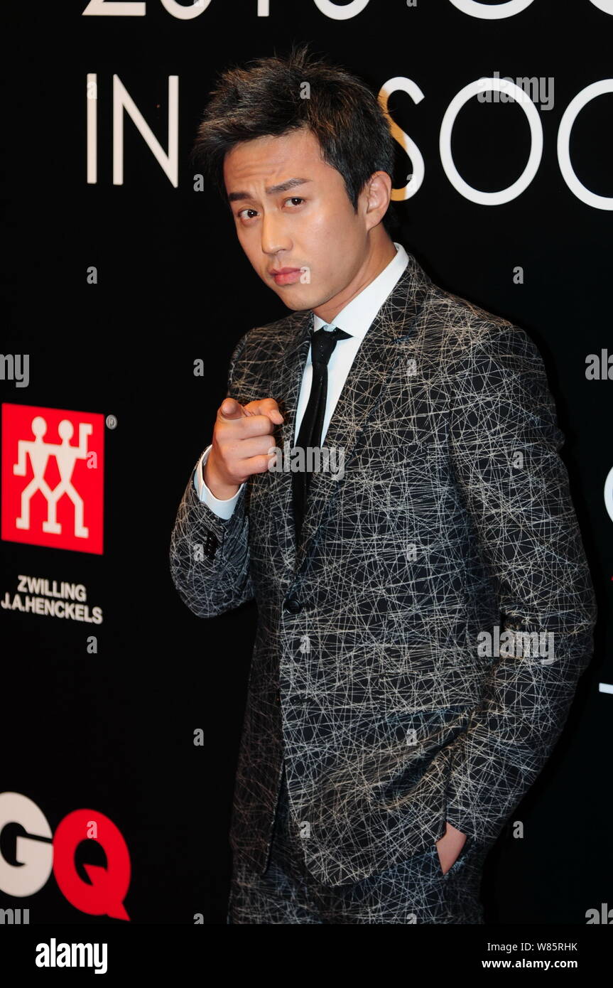 Chinese actor Deng Chao arrives on the red carpet for the award ...