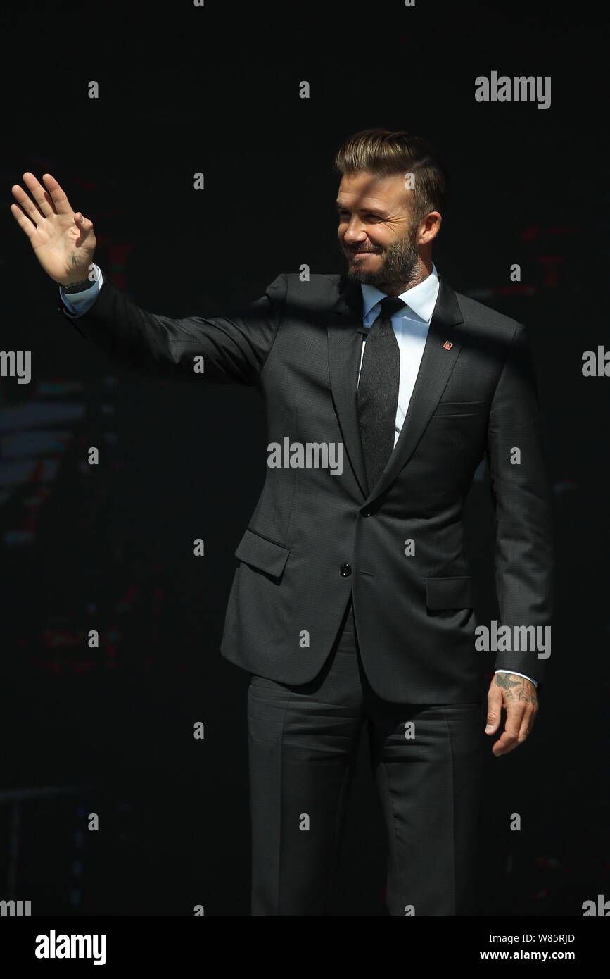 English soccer star David Beckham attends a press conference for Luneng ...