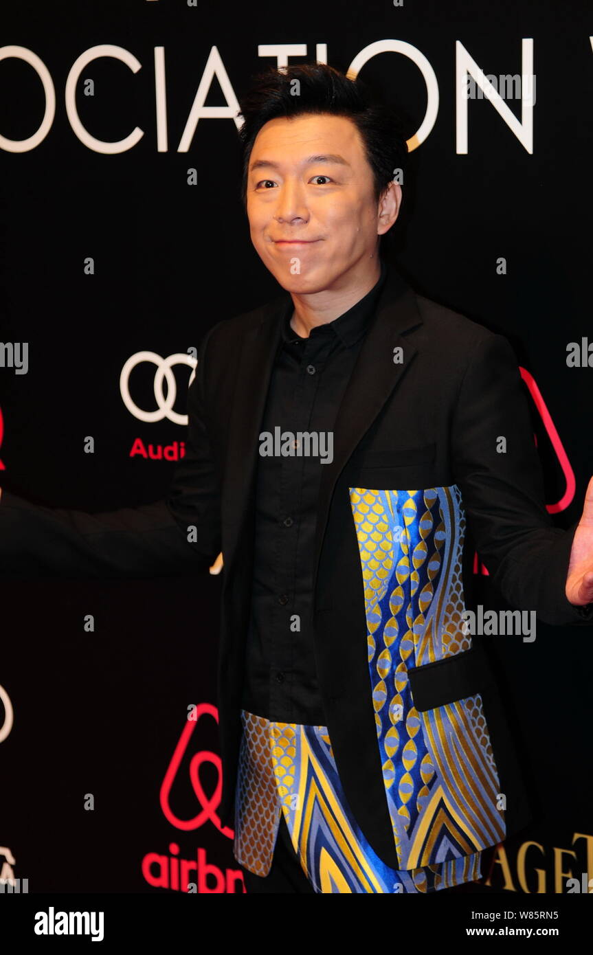 Chinese actor Huang Bo arrives on the red carpet for the award ceremony ...