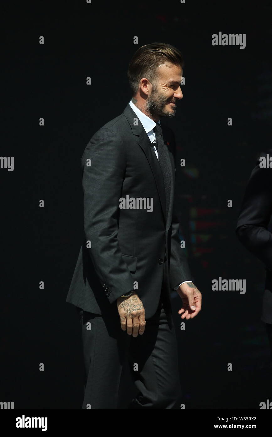 English soccer star David Beckham attends a press conference for Luneng ...