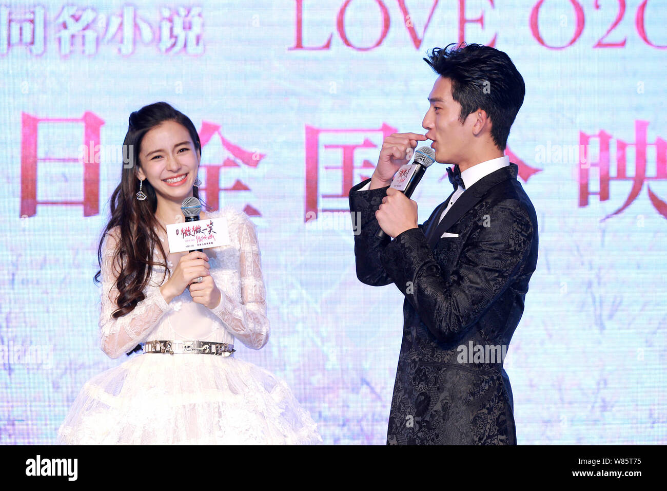 Hong Kong model and actress Angelababy, left, and Chinese actor Jing ...