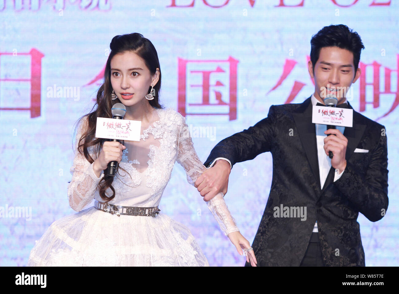 Hong Kong model and actress Angelababy, left, and Chinese actor Jing ...