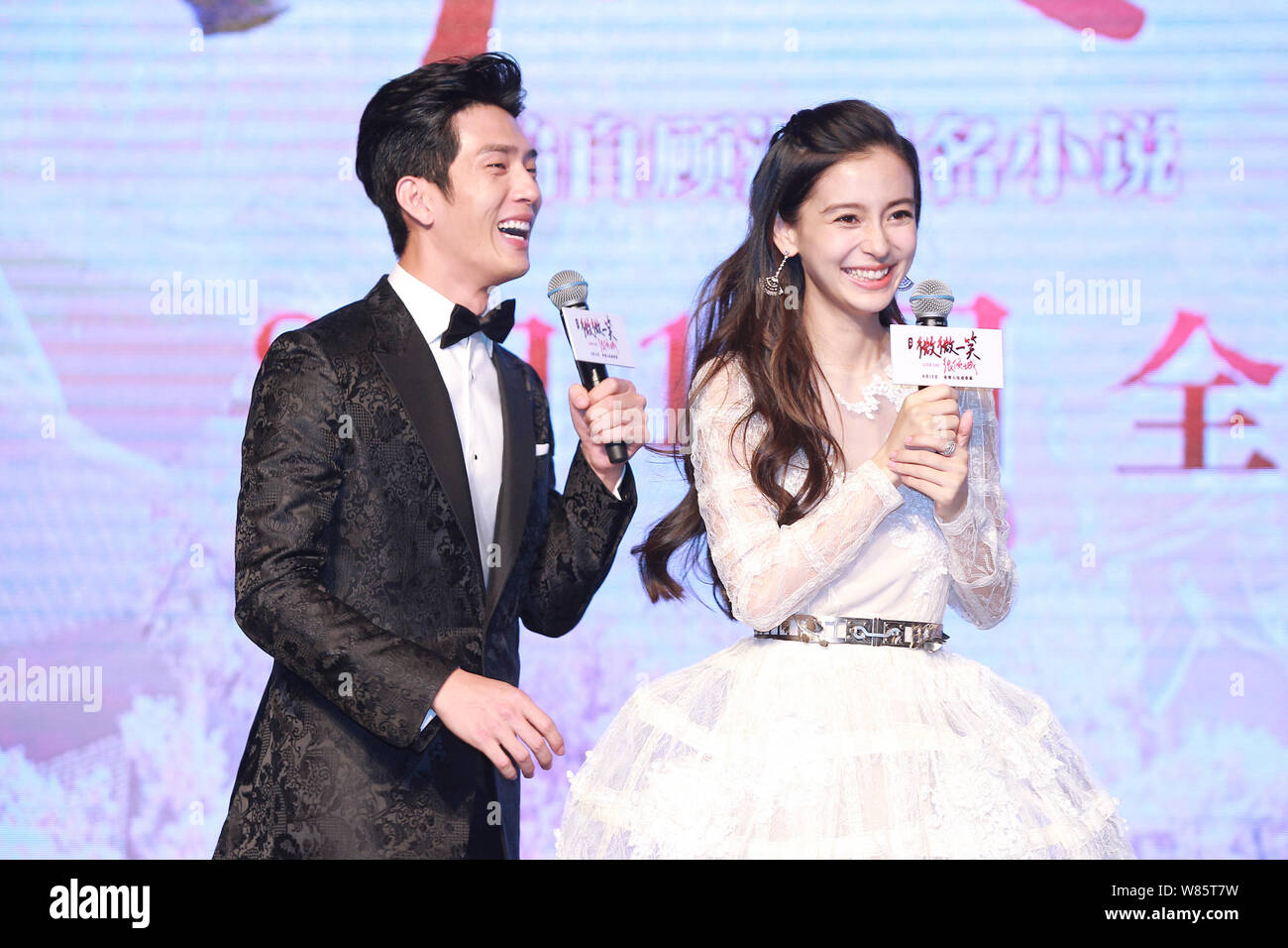 Hong Kong model and actress Angelababy, right, and Chinese actor Jing ...