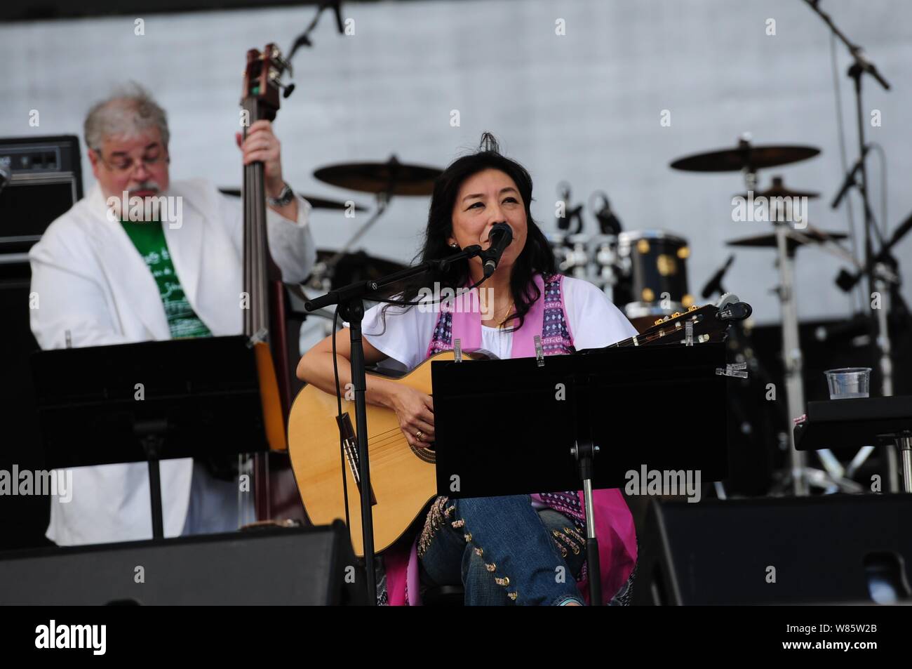 Japanese-Brazilian bossa nova singer Lisa Ono, right, performs during ...