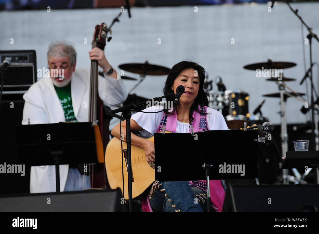 Japanese-Brazilian bossa nova singer Lisa Ono, right, performs during ...