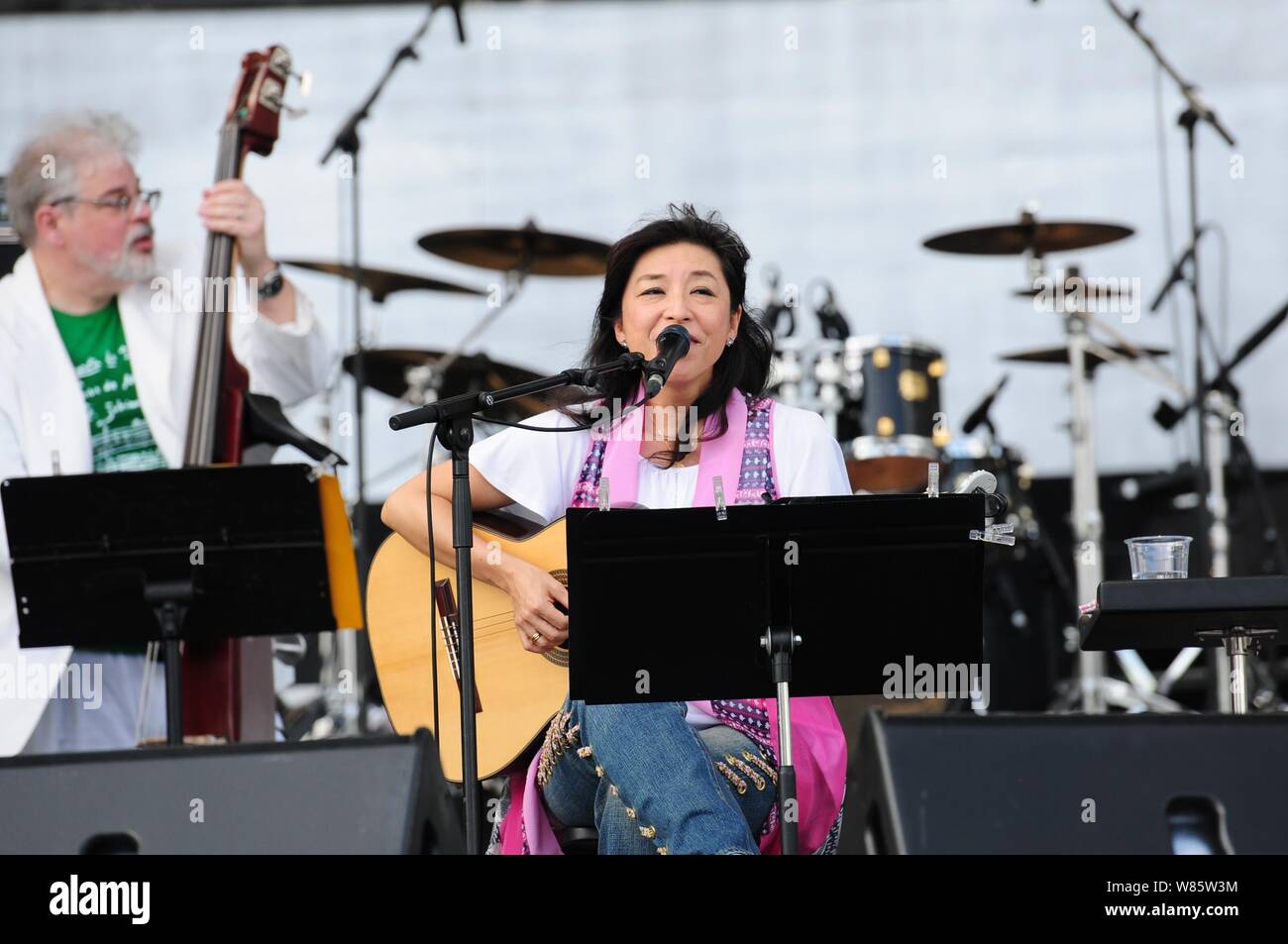 Japanese-Brazilian bossa nova singer Lisa Ono, right, performs during ...