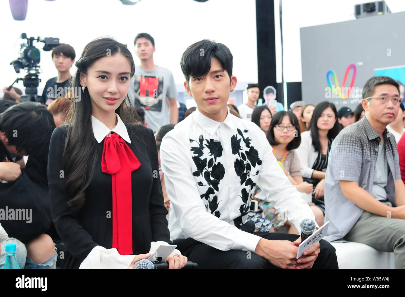 Hong Kong model and actress Angelababy, left, and Chinese actor Jing ...