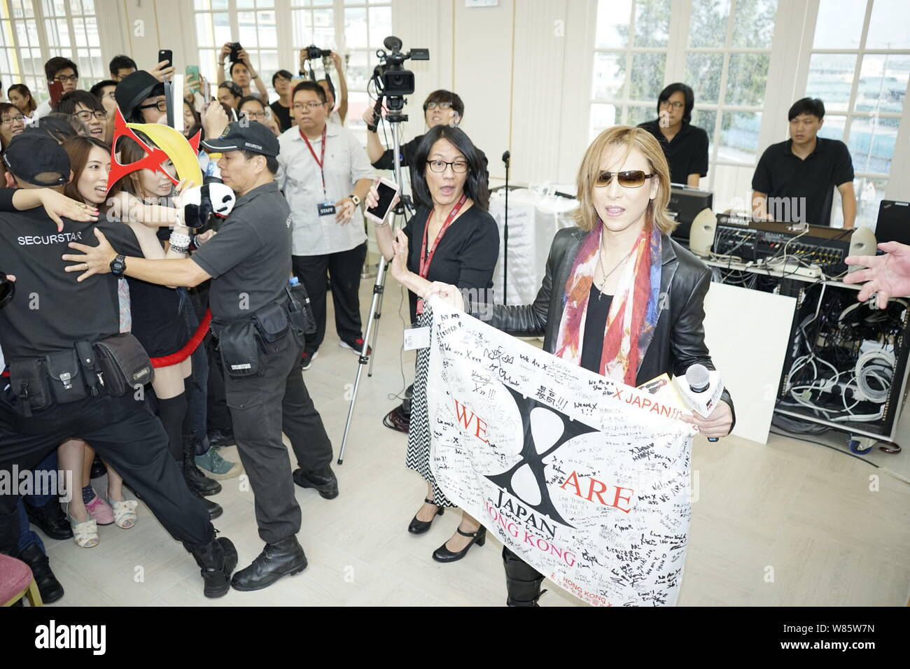 Singer and composer Yoshiki Hayashi, right, better known by his stage ...