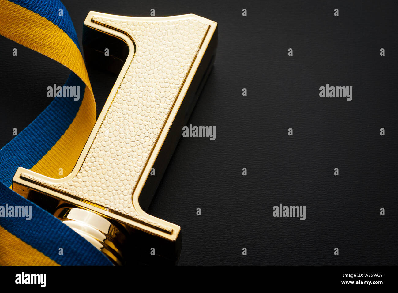 Trophy concept over black background hi-res stock photography and ...