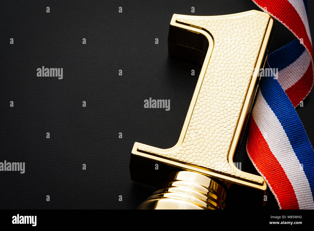 Gold award trophy for a first placed championship winner with a ...