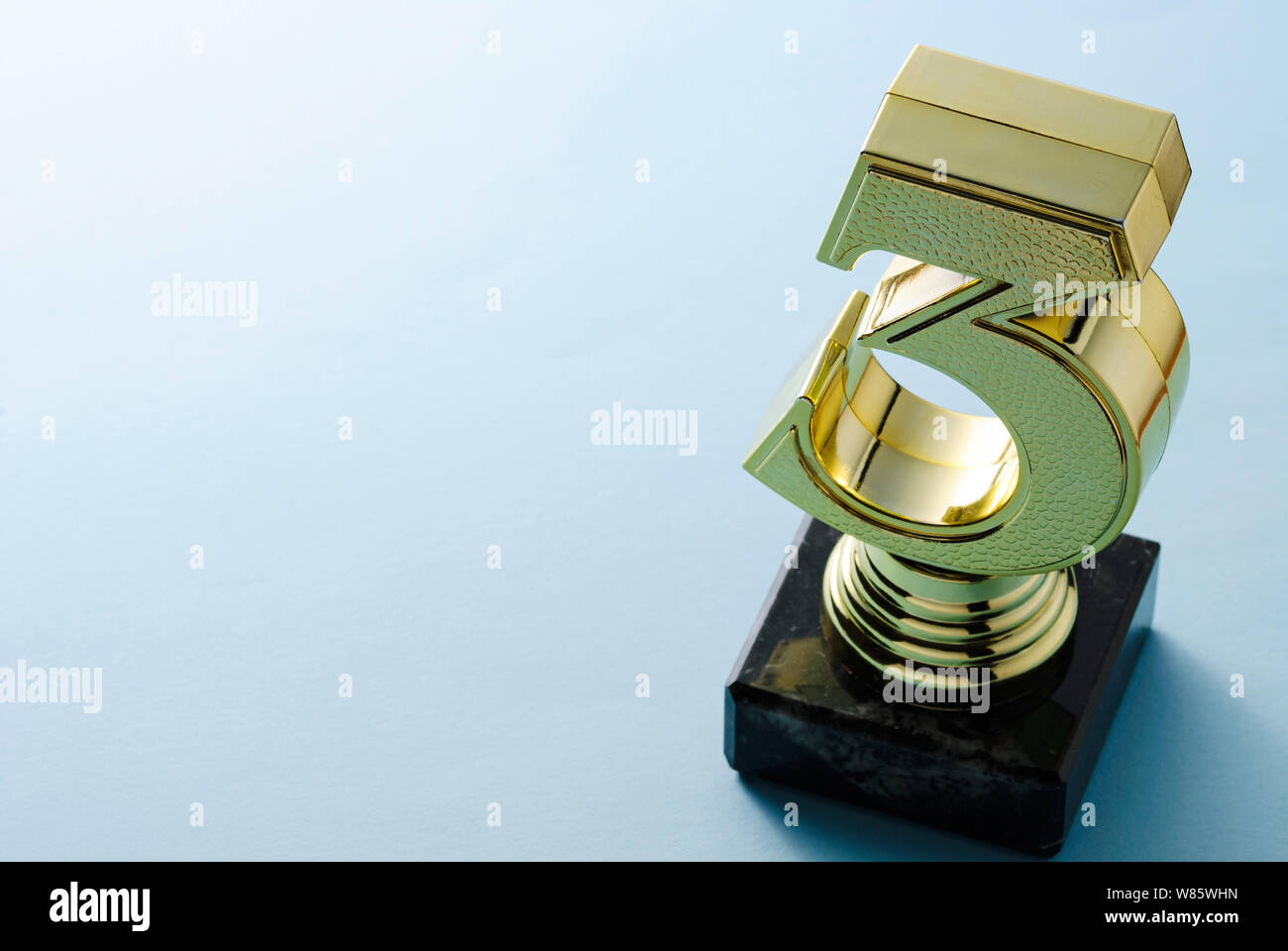 Number three gold trophy for a third placed runner up in a competition ...