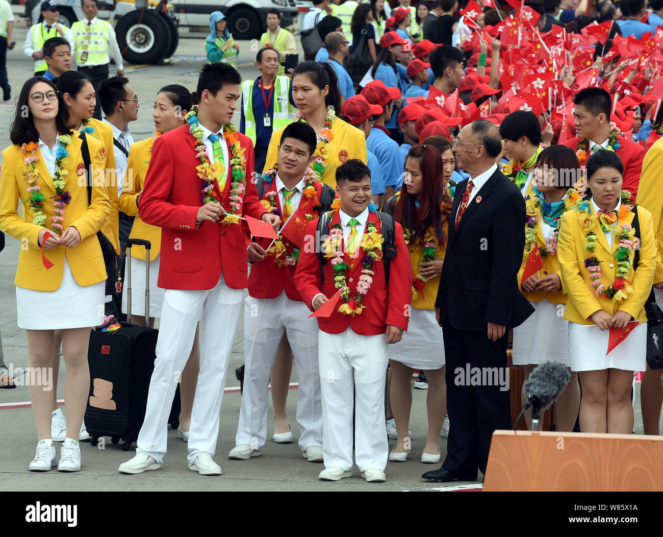 Chinese Olympic swimming champion Sun Yang, second left, and other ...