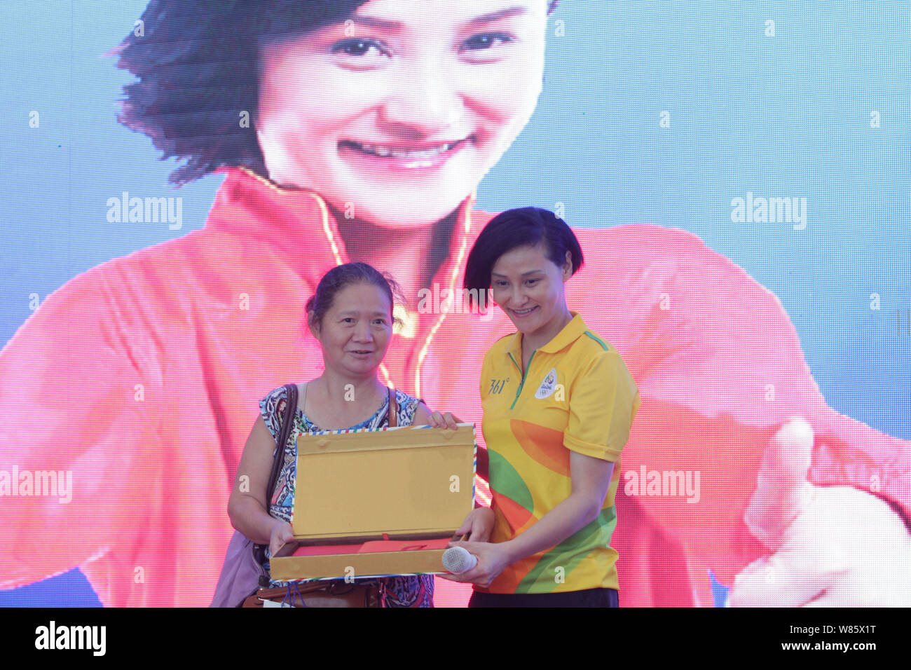 Former Chinese diver Gao Min, right, who won gold medals in the ...