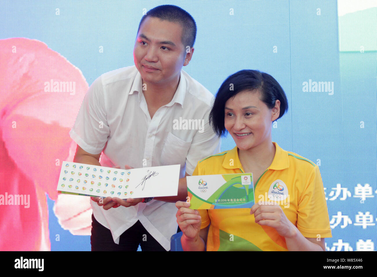 Former Chinese diver Gao Min, right, who won gold medals in the ...