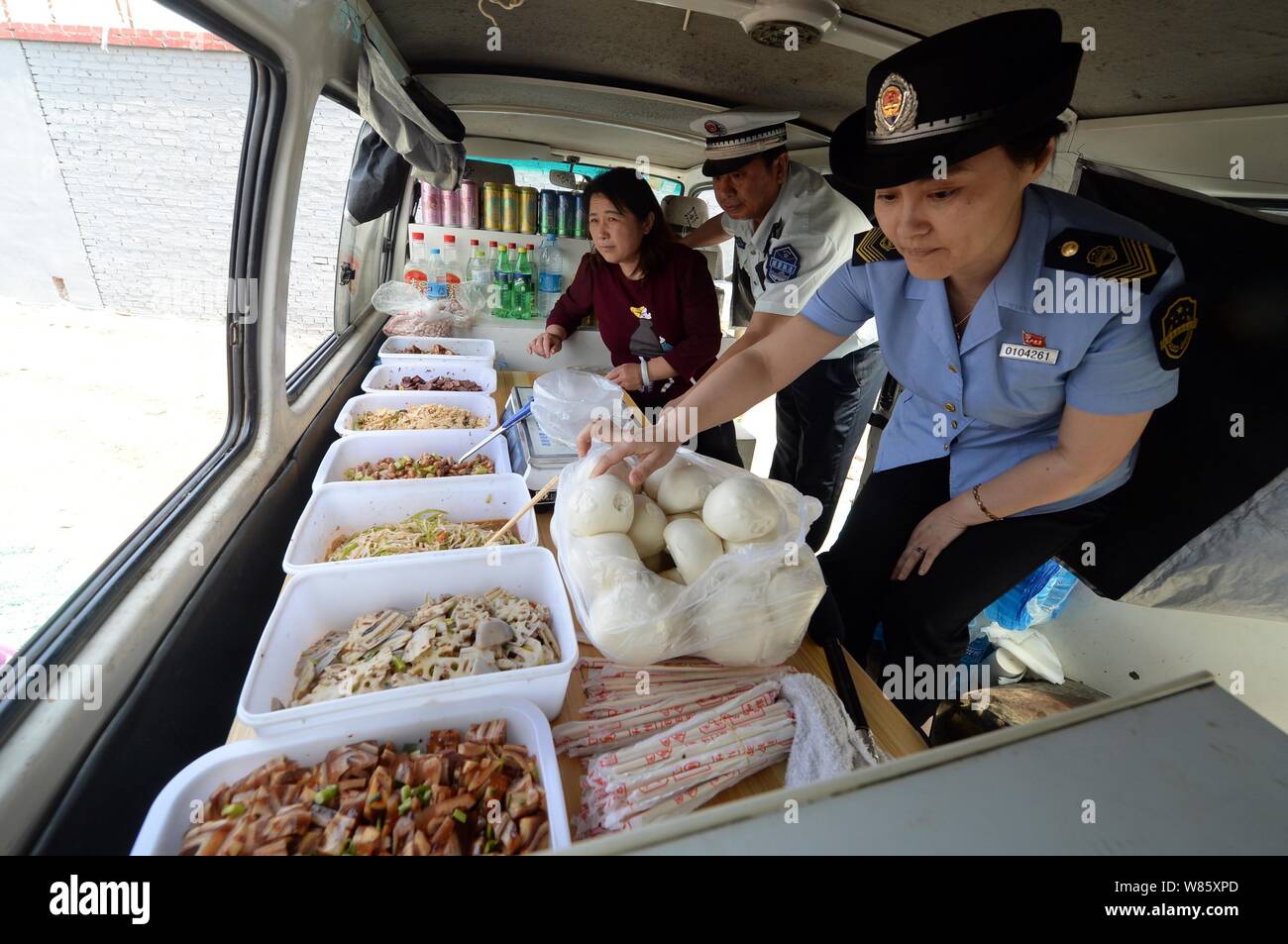 Urban enforcement officer china hi-res stock photography and images - Alamy