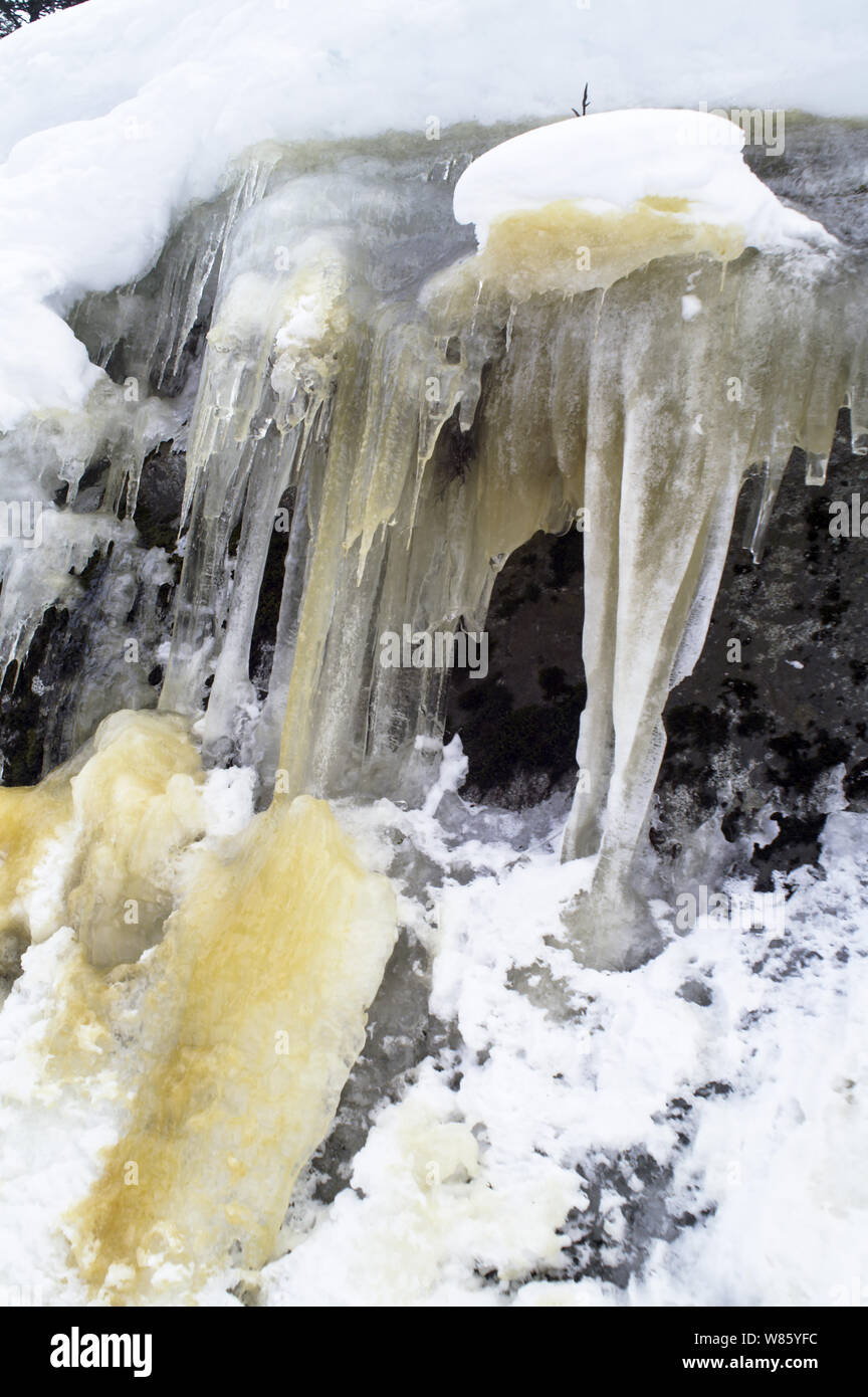 French Pyrenees.Icicles on a cliff face in the high Pyrenees. The ...