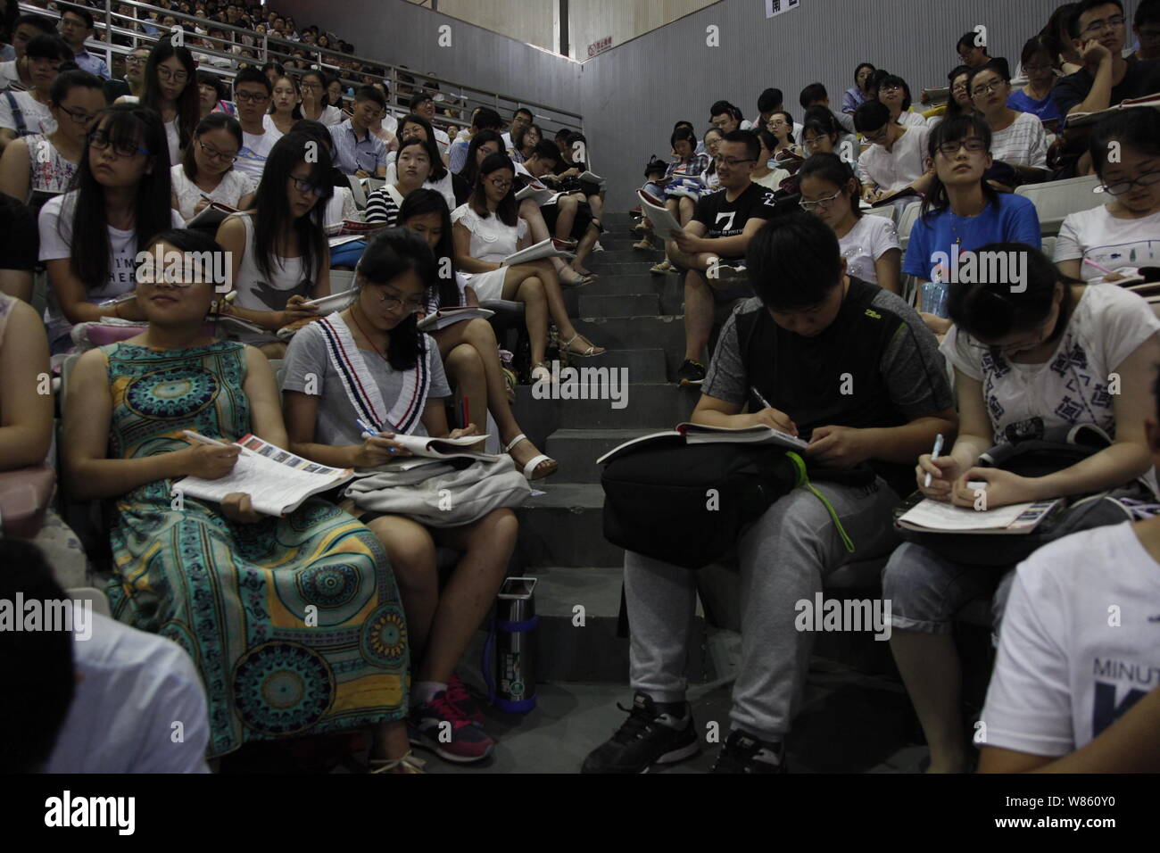 Chinese students take part in a tutorial and review session for the ...