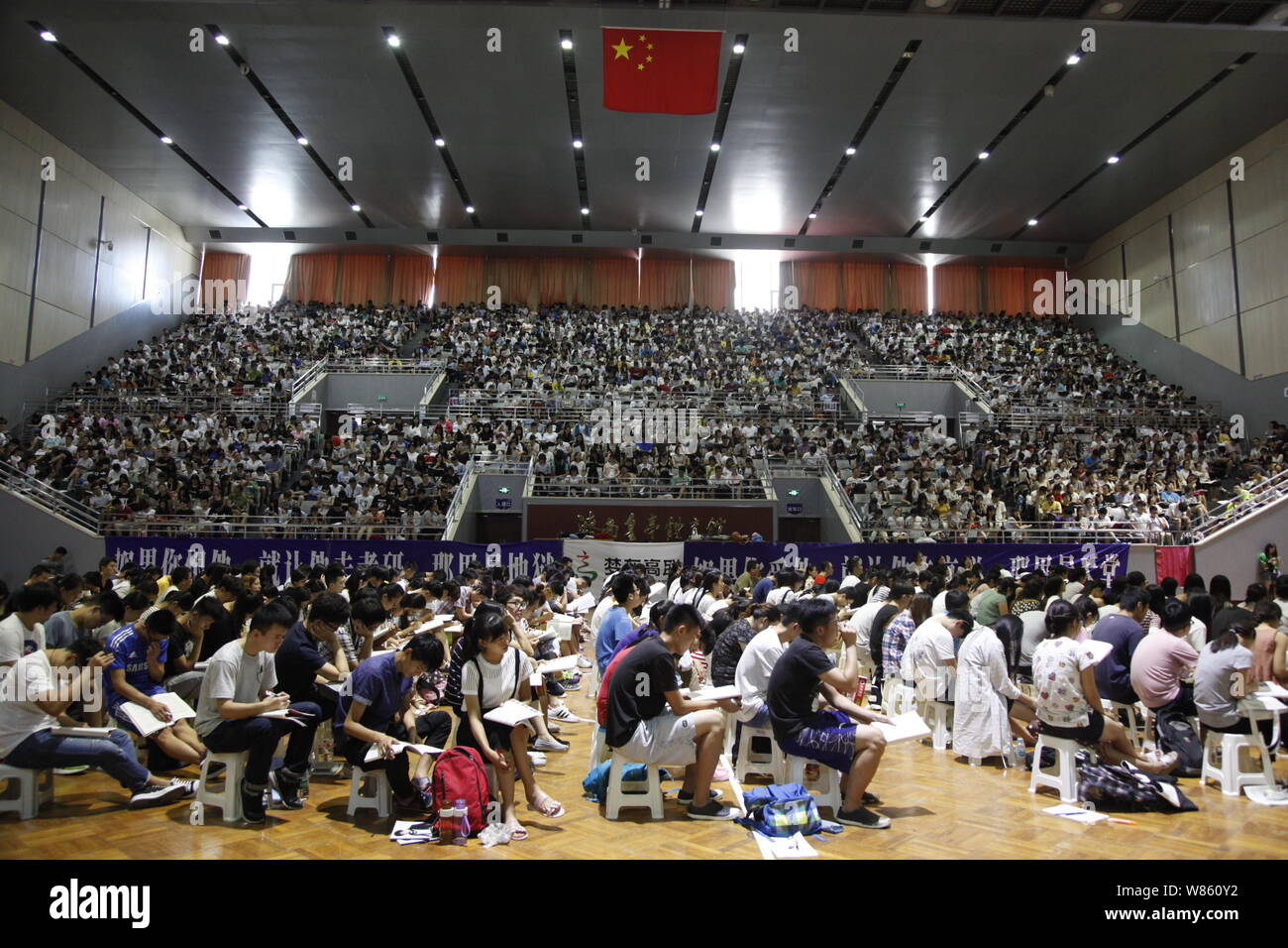 Chinese students take part in a tutorial and review session for the ...