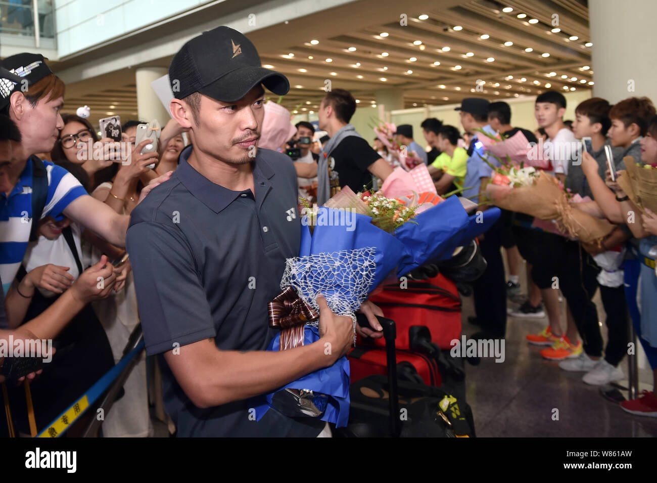 Chinese badminton player Lin Dan is pictured after coming back from the ...