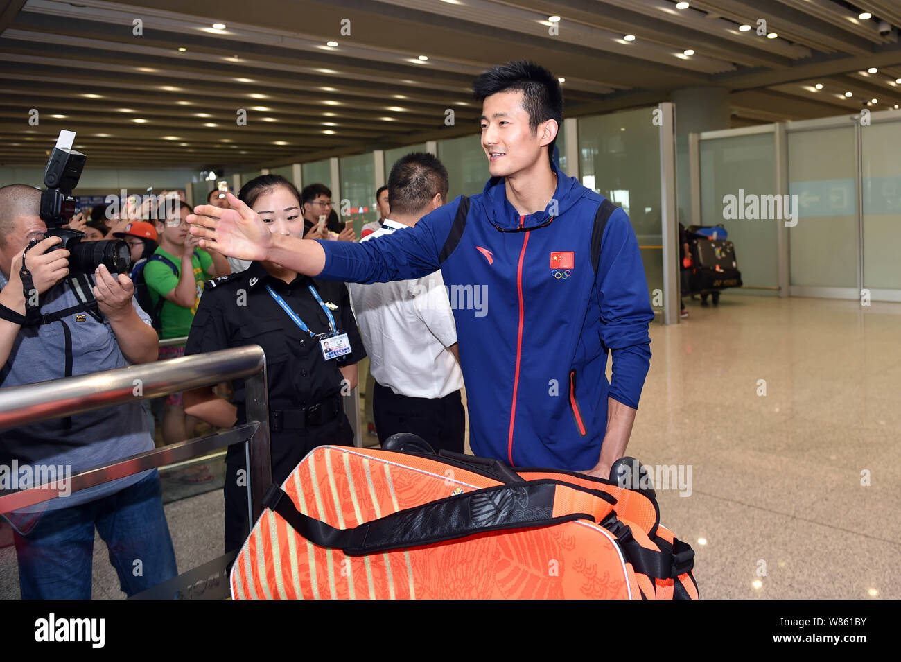 Chinese badminton player Chen Long, right, is pictured after coming ...