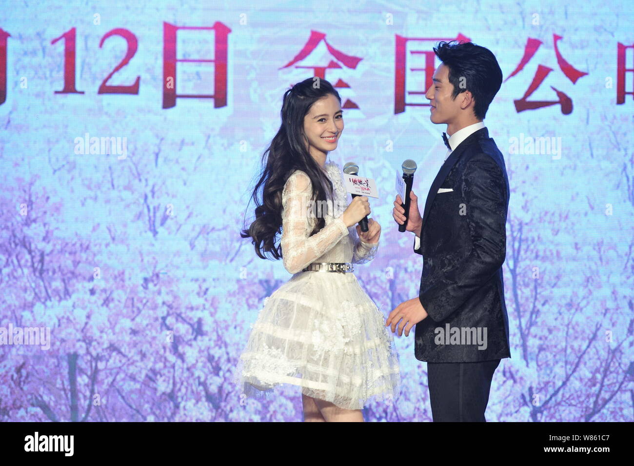 Hong Kong model and actress Angelababy, left, and Chinese actor Jing ...