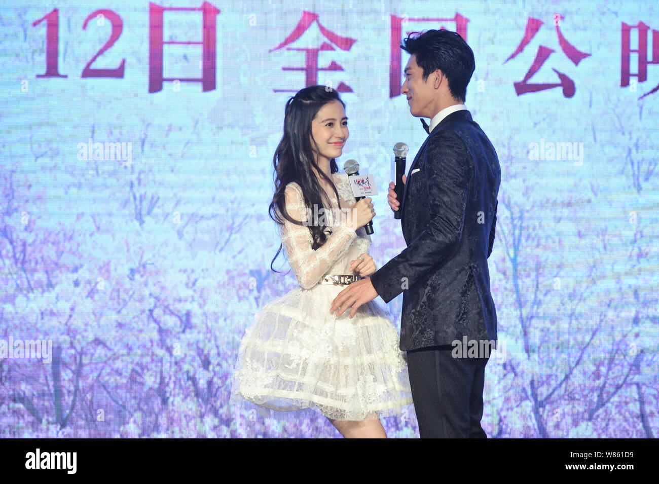Hong Kong model and actress Angelababy, left, and Chinese actor Jing ...