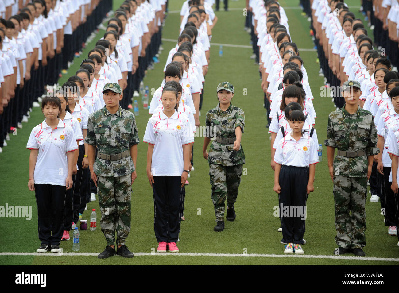 Young Chinese students attend the launch ceremony of their military ...